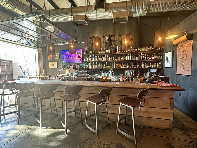 The bar area brings unexpected sophistication to a barbecue joint, complete with enough bottles to make any after-meal celebration memorable.