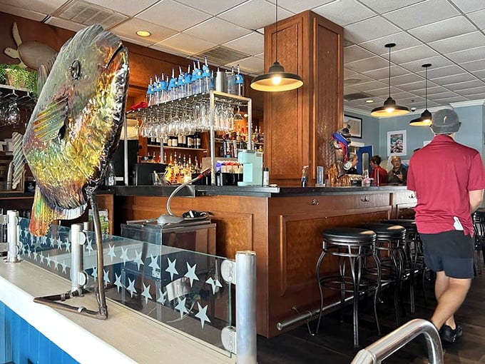 The bar's mounted fish seems to be saying, "You should see the one that got away," while bottles stand at attention.