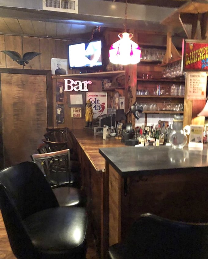 A proper bar area that welcomes you with the kind of rustic character modern chain restaurants spend millions trying to fake.