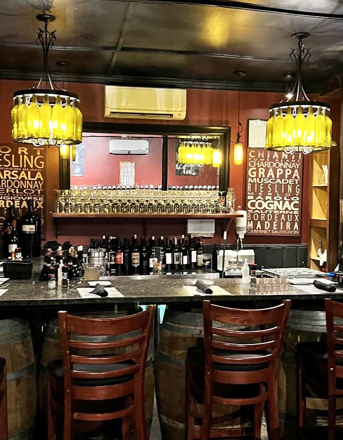 Yellow bottle chandeliers cast a golden glow over the bar&mdash;where wine varietals are spelled out like a roadmap to your next favorite glass.