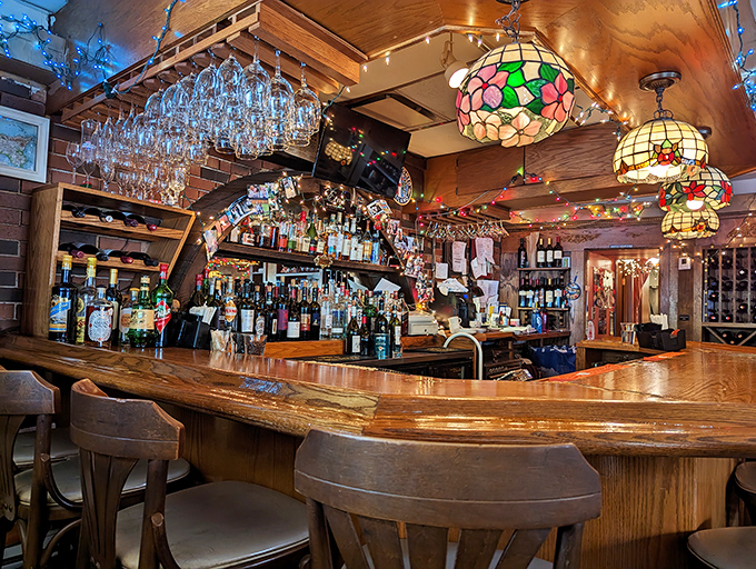 The bar at Etna isn't just stocked – it's a liquid library of Italian spirits where every bottle tells a story.