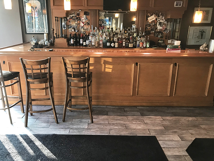 A bar stocked with bottles that tell stories of Italian hillsides and generations of distillers perfecting their craft.