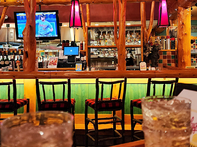 The bar glows like a campfire gathering spot, minus the mosquitoes but with better beverages.