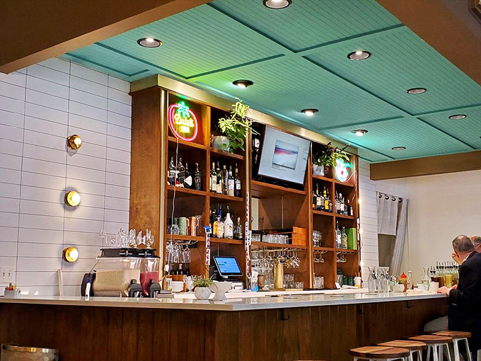 A bar that understands breakfast cocktails deserve the same respect as dinner ones. That turquoise ceiling adds just the right touch of retro charm.