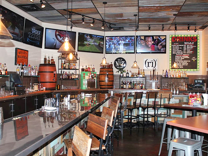 The bar at Sauced isn't just well-stocked&mdash;it's a bourbon lover's dream come true. Those barrel accents aren't just for show; they're foreshadowing the flavor journey ahead.