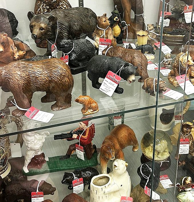 A menagerie of carved bears stands frozen in wooden perpetuity, like a taxidermy convention for creatures who've never actually breathed.