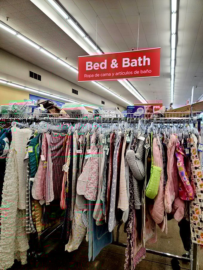 The Bed & Bath section, where yesterday's linens become tomorrow's guest room refresh. Cozy possibilities hang by the dozen.