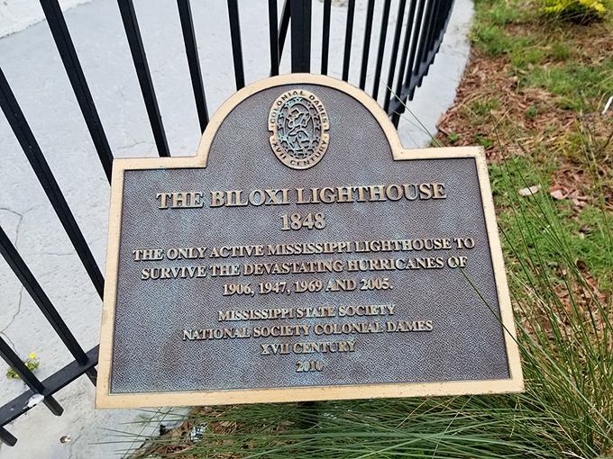 This commemorative plaque honors the lighthouse's remarkable resilience&mdash;the coastal equivalent of "nevertheless, she persisted."