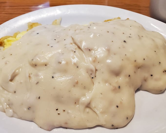 Biscuits and gravy so thick and creamy, you'll need a fork and a prayer to finish it all.
