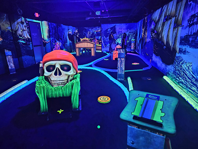 Blackbeard's Cove mini-golf glows with neon promise &ndash; the kind of place where family rivalries are born and competitive spirits unleashed.