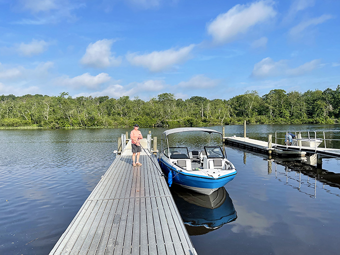 A perfect day on the water starts at this peaceful dock. The boat's ready, the water's calm, and your excuses for not relaxing just evaporated.
