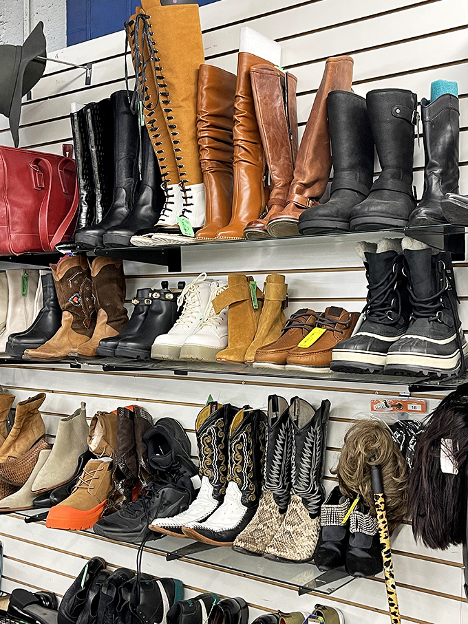Boot boulevard! A leather lover's dream where cowboy meets fashionista, and winter warriors stand at attention next to summer statement pieces.