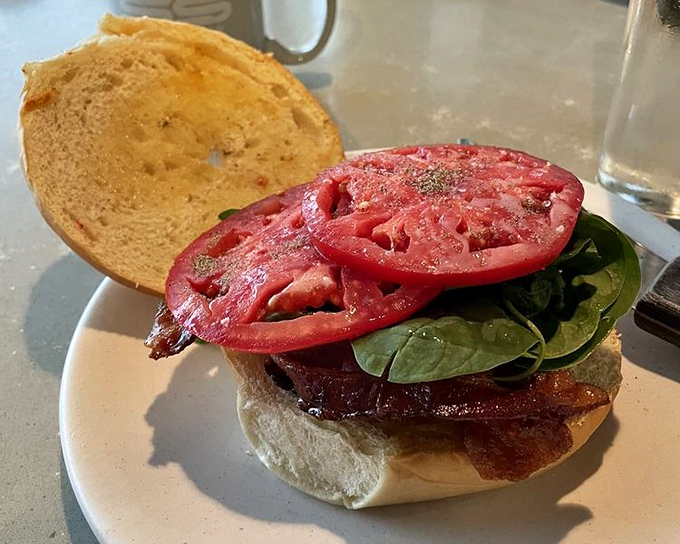 A sandwich that understands the importance of proper architecture&mdash;fresh tomato and spinach stacked with precision that would impress Frank Lloyd Wright.
