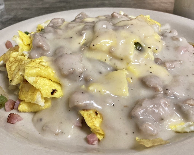 The Breakfast Haystack &ndash; where eggs, ham, and gravy perform a delicious balancing act that defies gravity.