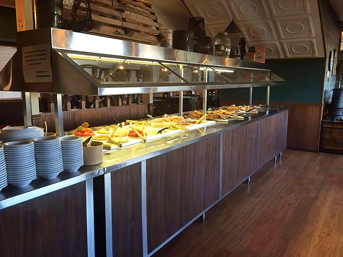 The buffet line&mdash;where food dreams begin and diet plans end. Steam rising from fresh offerings is nature's most beautiful fog.