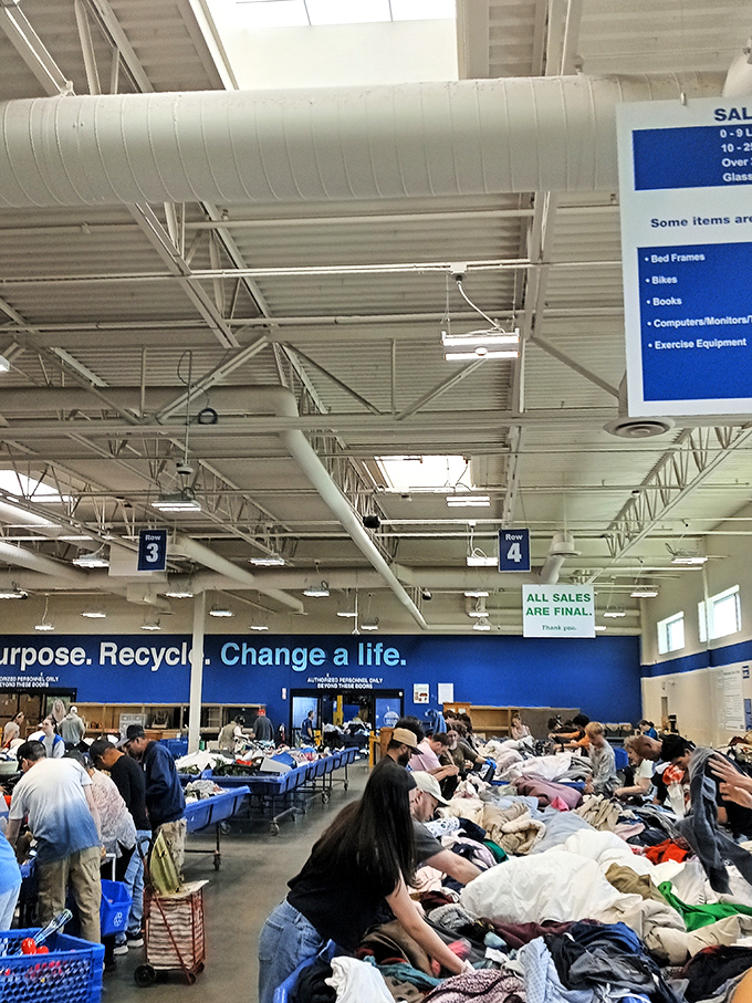 Overhead signs guide the experienced and novice alike through this warehouse of possibilities where patience is truly rewarded.