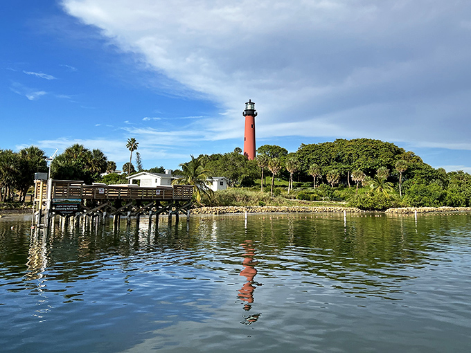 Reflections double the beauty as the lighthouse's image dances on the inlet waters&mdash;nature's own Instagram filter at work.