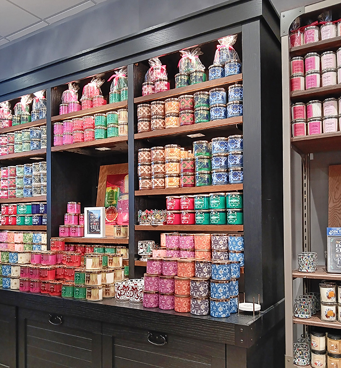 Bath & Body Works candle display that could double as an art installation. A fragrance rainbow promising your home can smell like "Moonlit Path" or "Mahogany Teakwood."
