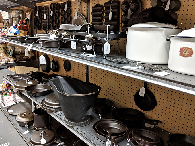 Cast iron cookware that could tell tales of Sunday dinners past. These pans have outlived the stoves they once sat upon.