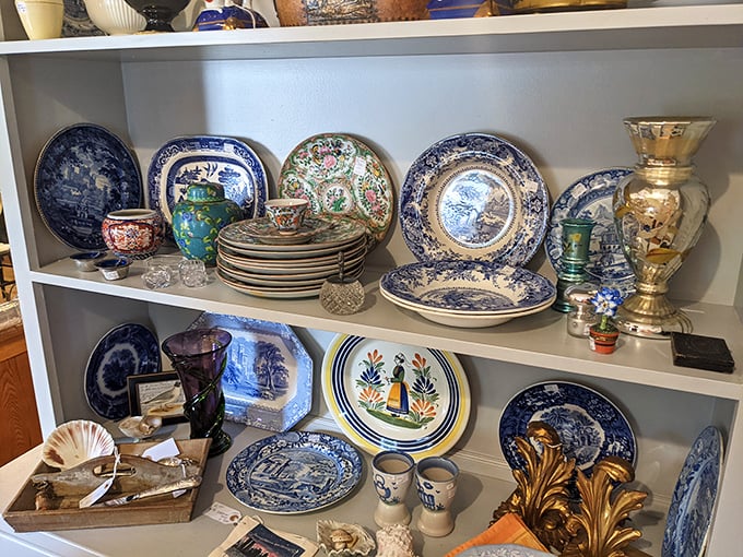 Blue and white porcelain displays tell tales of dining rooms past, each plate a circular storybook of another era's aesthetic.