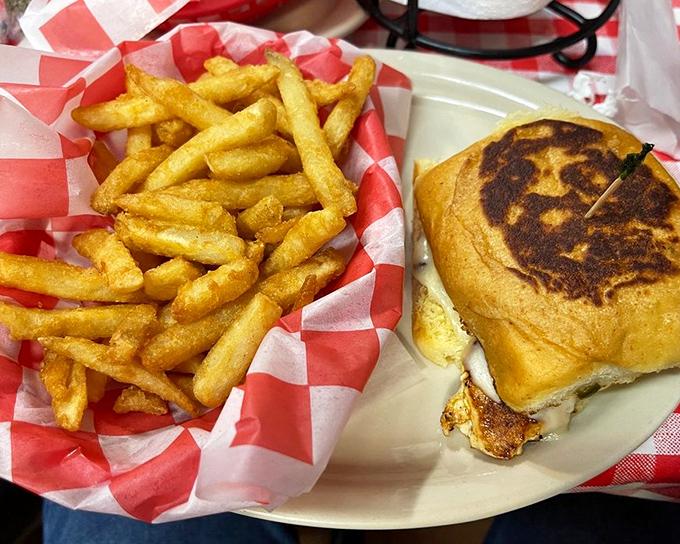 The chipotle chicken sandwich arrives golden and ready to prove that even the non-burger options here don't mess around with portions.