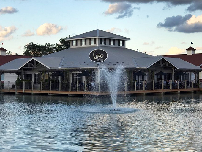 Ciao Bella's evening glow creates dining magic as the lighthouse tower watches over another perfect Lake Erie sunset.