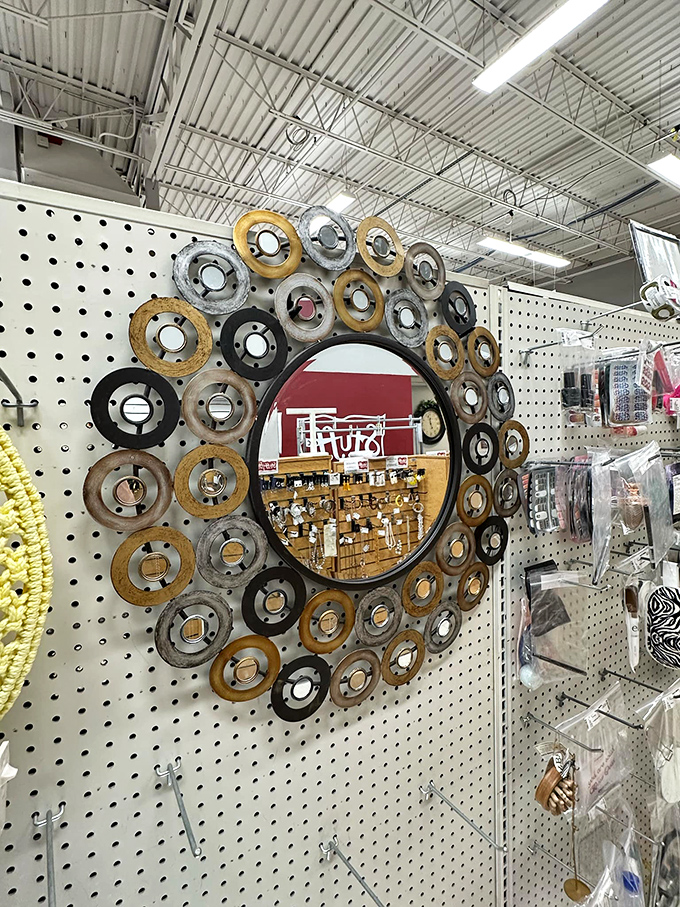 Talk about upcycling genius&mdash;this mirror framed with vintage hardware turns industrial castoffs into wall art worthy of a design magazine.