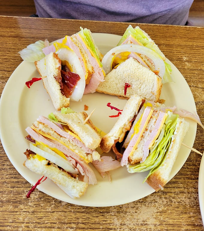 Club sandwich quarters arranged like a delicious clock&mdash;marking the time you'll spend savoring every perfectly stacked bite.