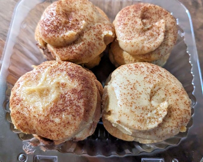 These coco puffs aren't the breakfast cereal&mdash;they're pillowy pastries dusted with cinnamon that disappear faster than your vacation days.