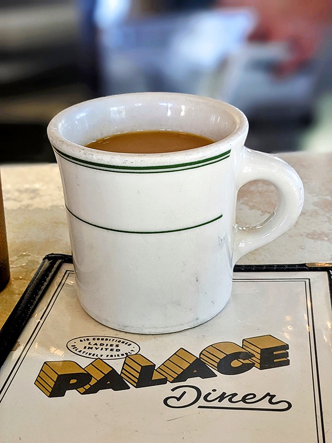 The classic diner mug – holding what might be the most honest cup of coffee in Maine. No pretension, just pure caffeinated comfort.