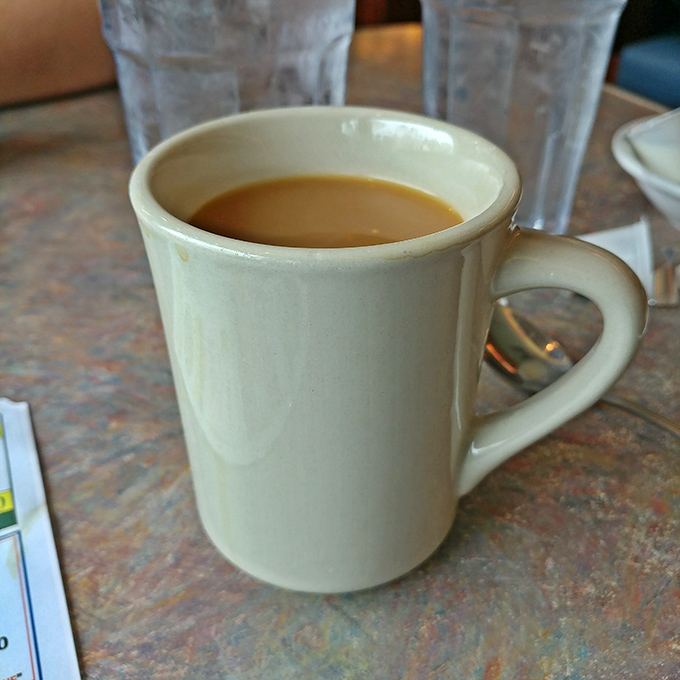 That perfect diner coffee &ndash; not fancy, not pretentious, just reliably good fuel for conversations that solve the world's problems.