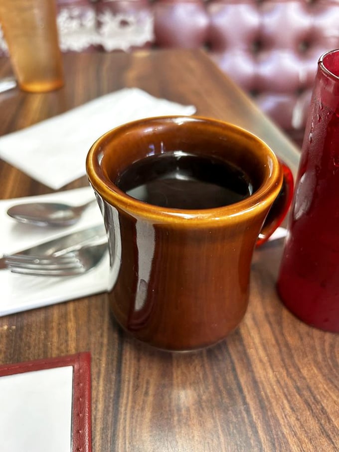Diner coffee in a proper ceramic mug&mdash;strong, honest, and refilled without you needing to make awkward eye contact first.
