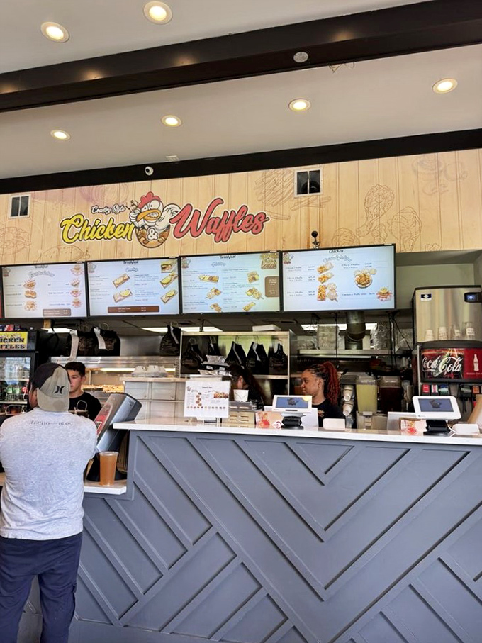 Clean lines and modern efficiency meet old-school hospitality at the counter where your breakfast dreams become delicious reality.
