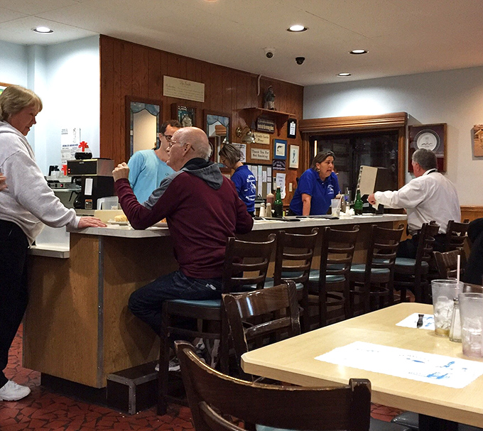 The counter's where regulars hold court, solving world problems between bites of perfection.