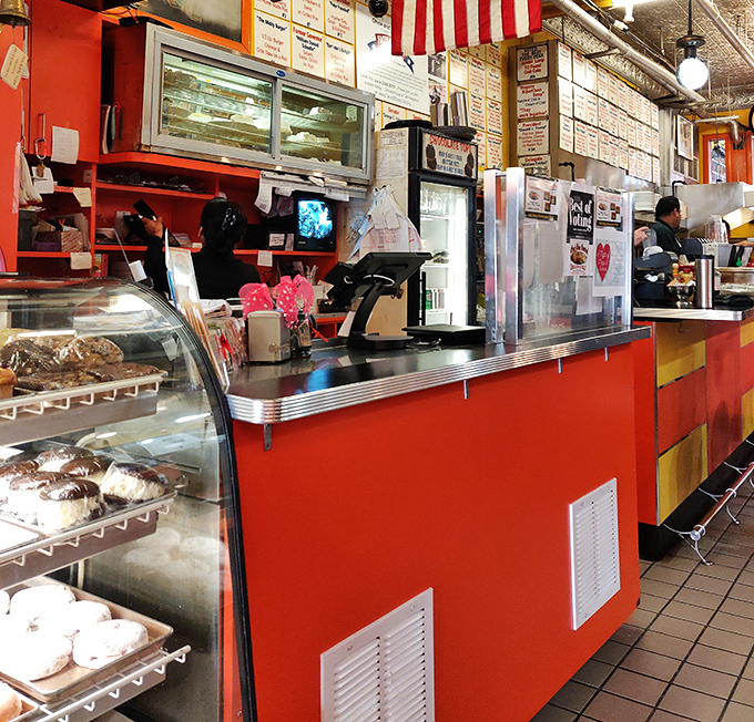 The bakery counter showcases sweet temptations that make "I'll just have coffee" the biggest lie told in Annapolis every single day.