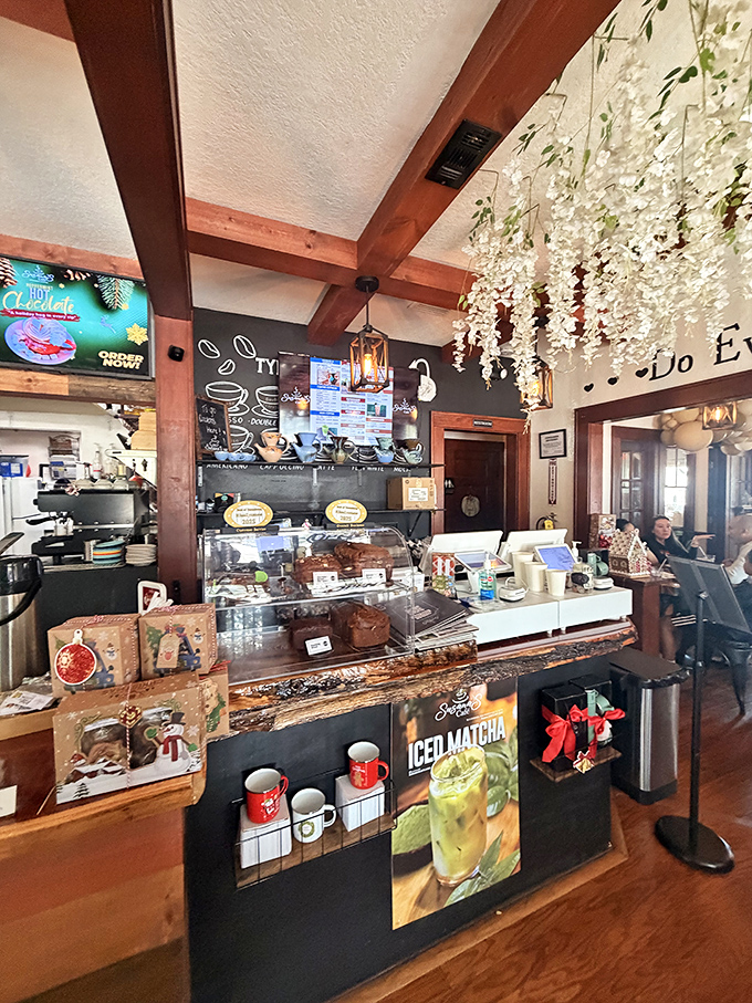 A counter that showcases both coffee expertise and pastry temptations. Resistance is futile, but regrets are impossible.