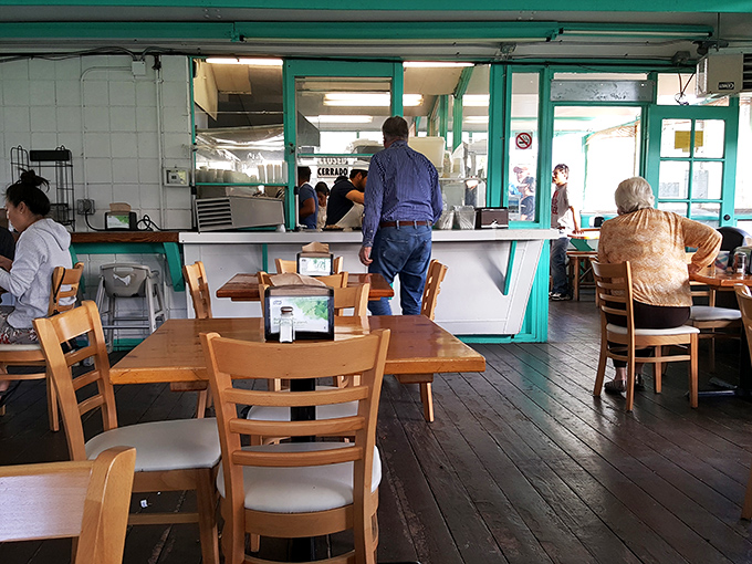 The counter where dreams come true &ndash; place your order, then join the community of hopeful faces waiting for their names to be called.