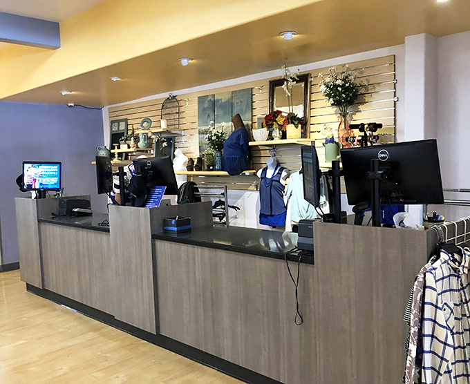 At the checkout counter, friendly staff efficiently process the day's discoveries while mannequins stand guard over a final display of impulse-worthy accessories.