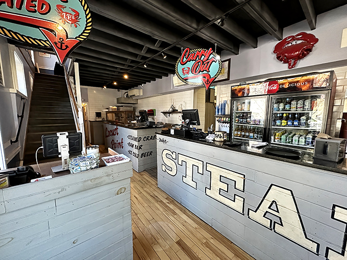The counter welcomes you with its "Come Get Steamed" sign—an invitation that's impossible to refuse in this temple of Maryland seafood.