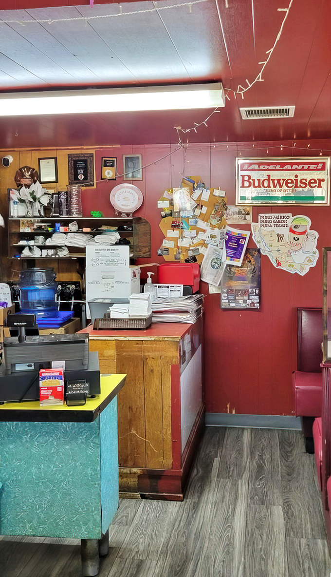 The counter area – command central for this culinary operation, where orders are shouted, tickets are hung, and magic happens behind the scenes.