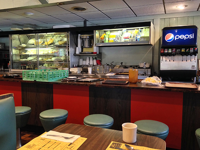 The counter area offers a glimpse behind the curtain &ndash; where breakfast magic happens amid the reassuring hum of a restaurant that knows exactly what it's doing.