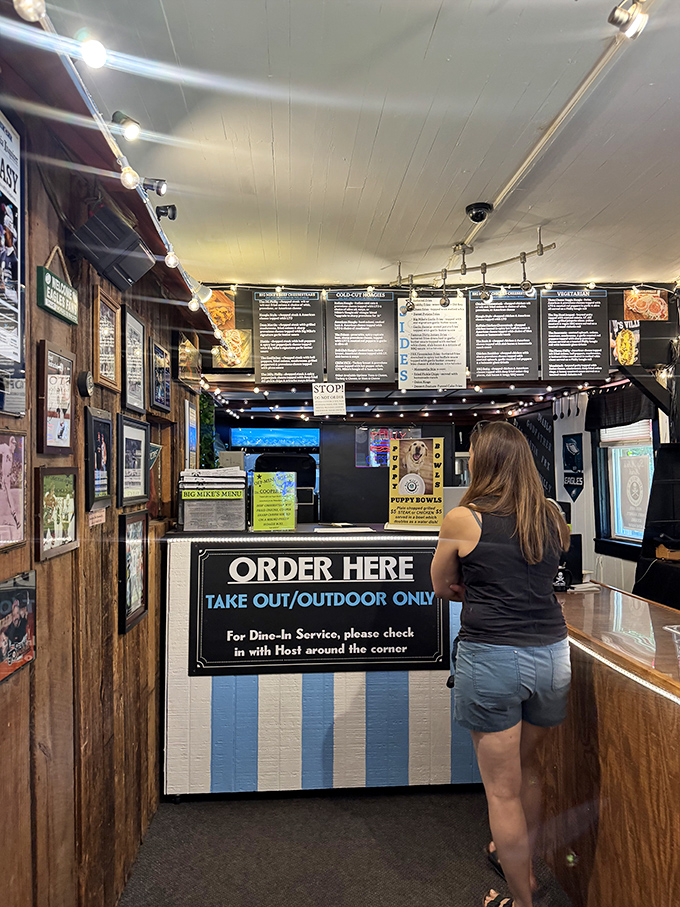 The ordering counter&mdash;where dreams are placed and sandwich magic begins&mdash;complete with an impressive menu board that demands multiple visits.