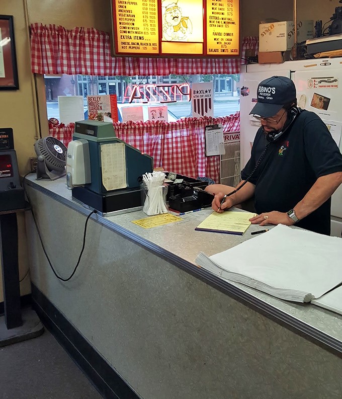 Where pizza orders are still taken by phone and written by hand. No apps, no algorithms&mdash;just humans making food for humans.