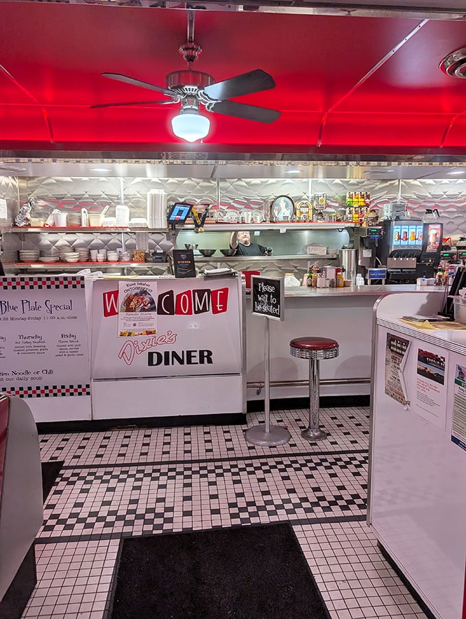 The counter welcomes you with a cheerful "WELCOME" sign &ndash; the starting line for your journey into classic American diner cuisine.