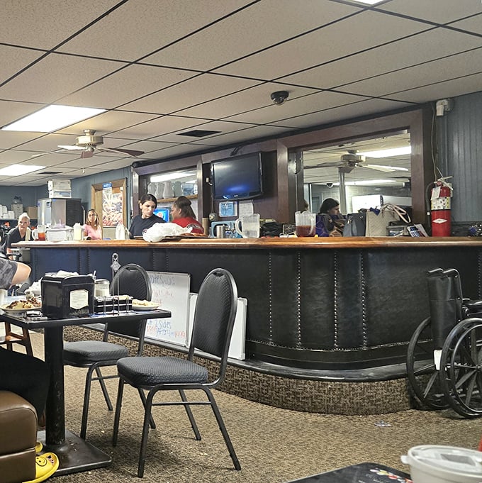 The counter area&mdash;where regulars perch like birds on a wire, watching the choreographed dance of diner service.