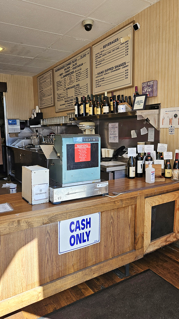 The counter area is command central, where magic happens with methodical precision. Note the cash-only sign&mdash;some traditions refuse to budge.