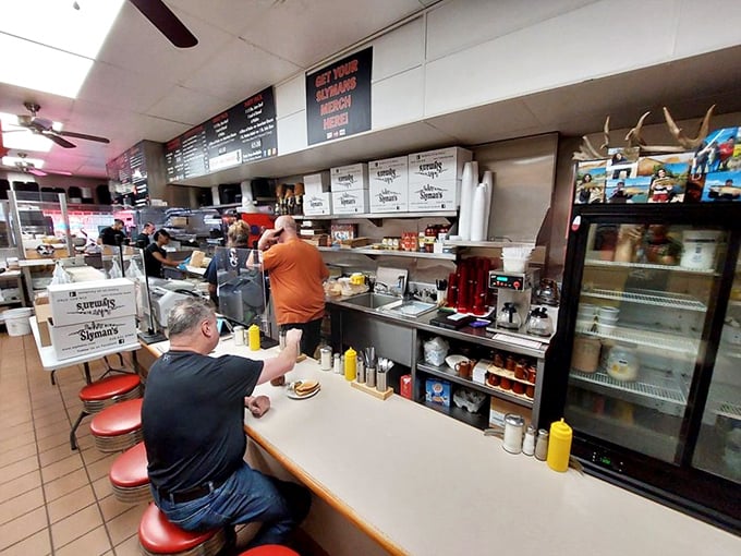 Where sandwich magic happens &ndash; the counter seating offers front-row tickets to the delicious choreography of a busy deli kitchen.