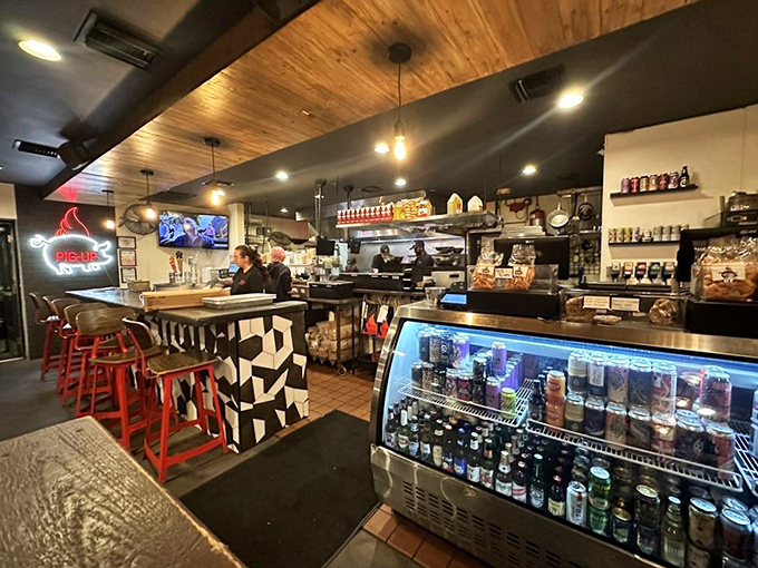 The ordering counter showcases a well-oiled operation where efficiency meets enthusiasm for exceptional barbecue.