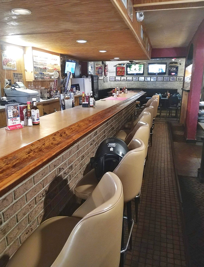 The bar where strangers become friends and regulars are family. Those cream-colored seats have heard some stories, let me tell you.