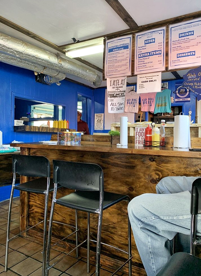 Blue walls, wooden counter, and no-nonsense service create the perfect backdrop for seafood that needs no fancy presentation.